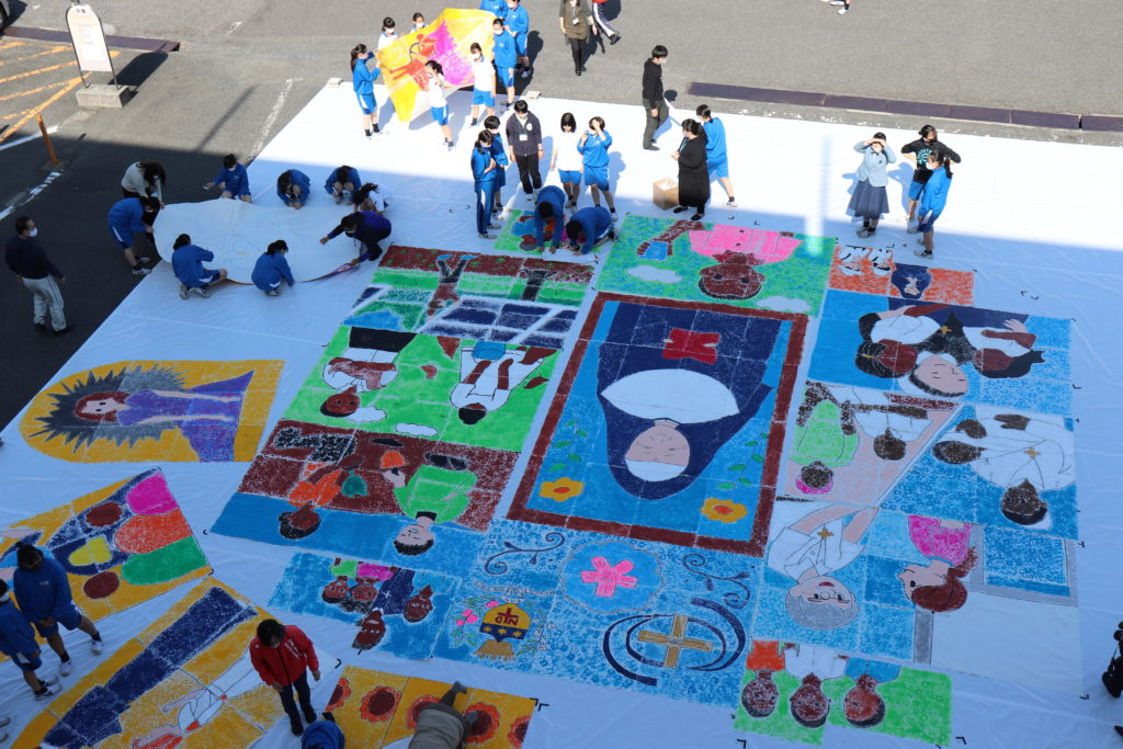 Handprint Mosaic Art: Sunflower on Our Tarp | HAGIHARA Industries Inc.